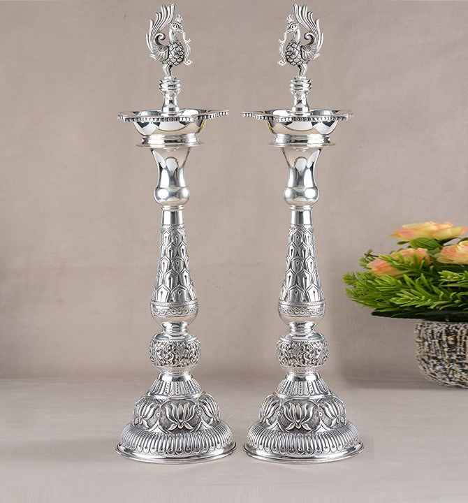 Peacock Silver Deepam Stand Pair – Krishna Jewellers Pearls and Gems ...
