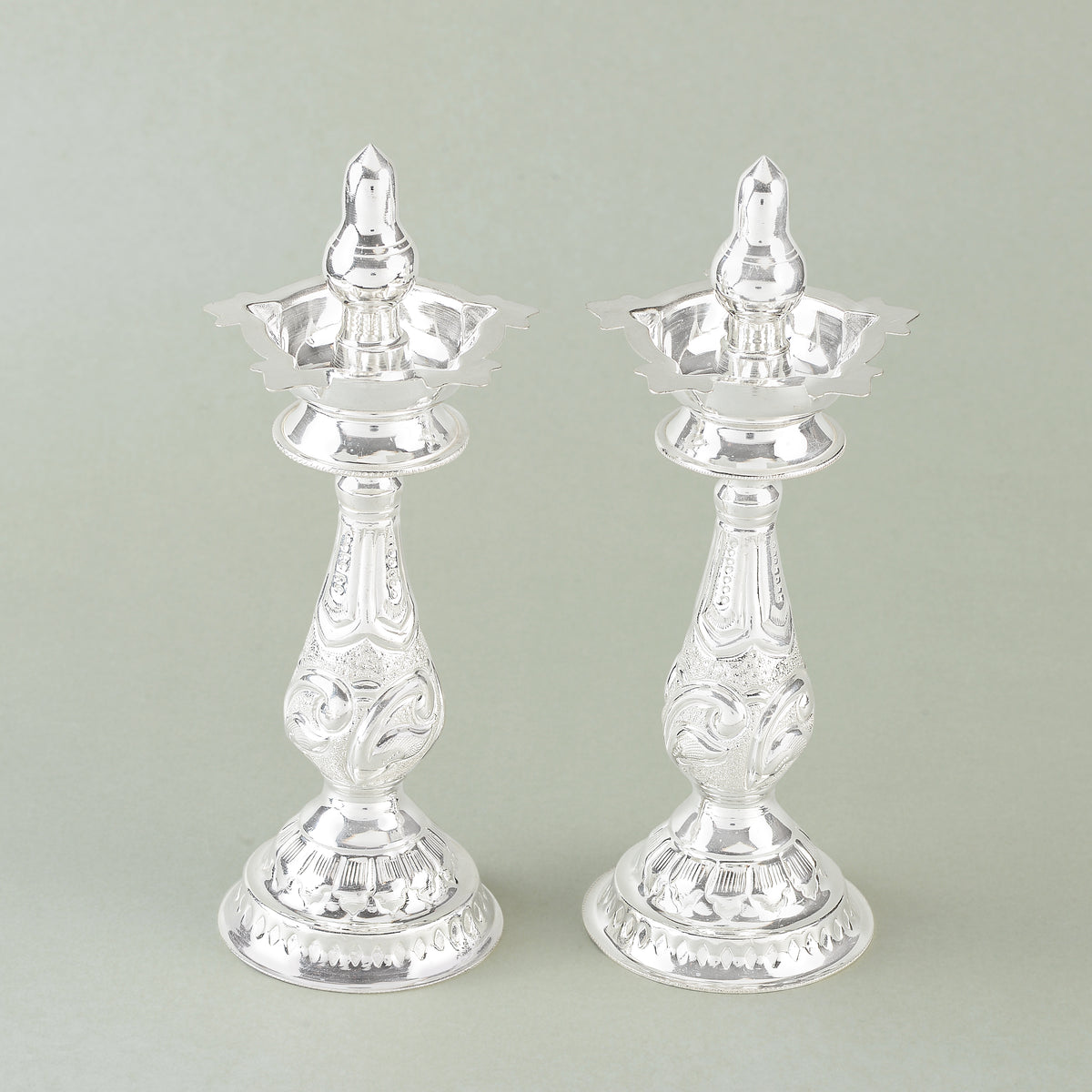 silver-deepam-stand-1 – Krishna Jewellers Pearls and Gems Pvt Ltd
